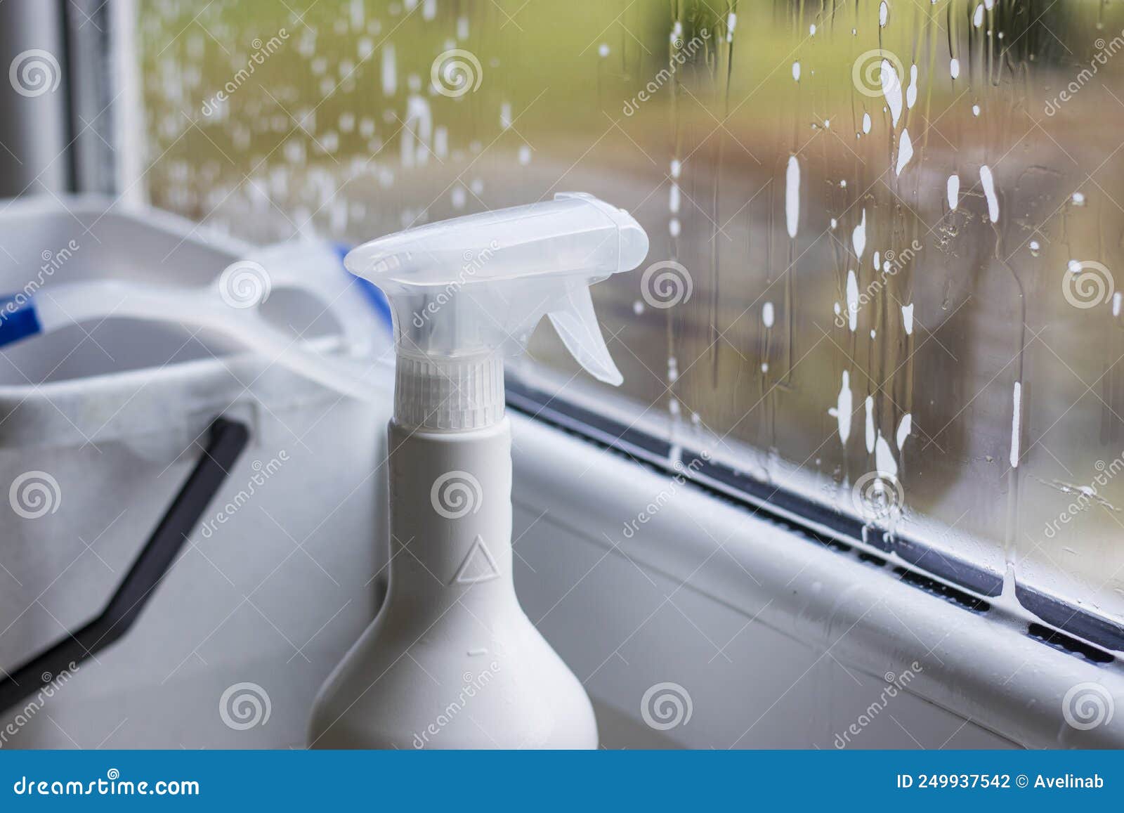 Window Cleaning Detergent. Washing the Glass on the Windows with ...