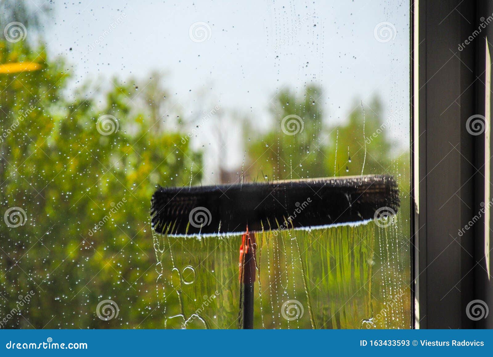Window Cleaning Using Telescopic Water Brush and Wash System Stock ...