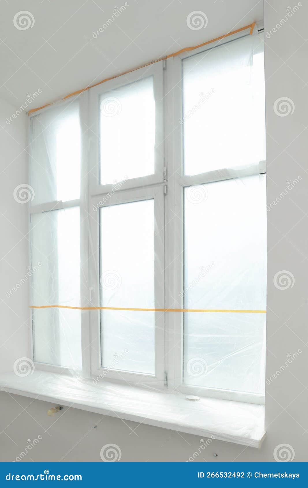Window Covered with Polyethylene Film. Protection during Repair Stock ...