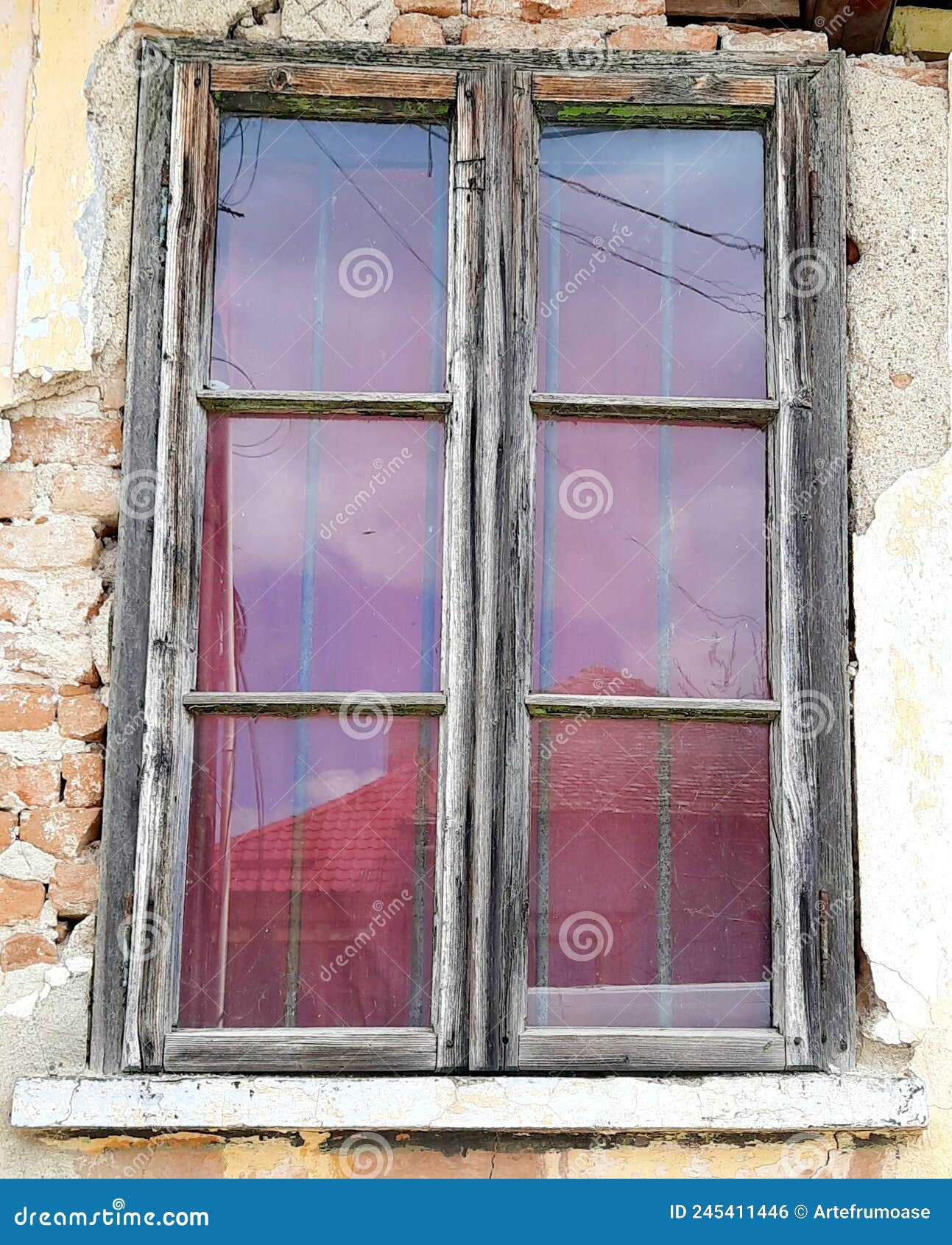 Window at Creepy House in Ruins with Fallen Plaster and Exposed Bricks ...