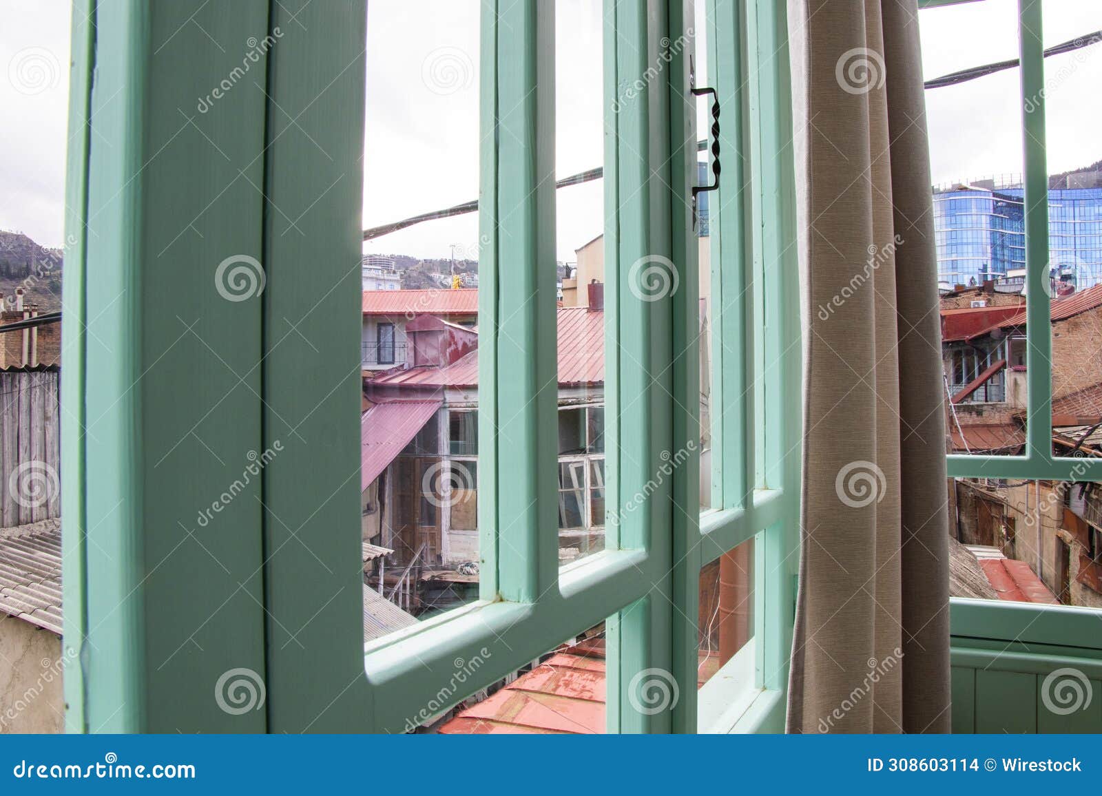 An Open Window with Curtains on Top and City View Outside Stock Photo ...