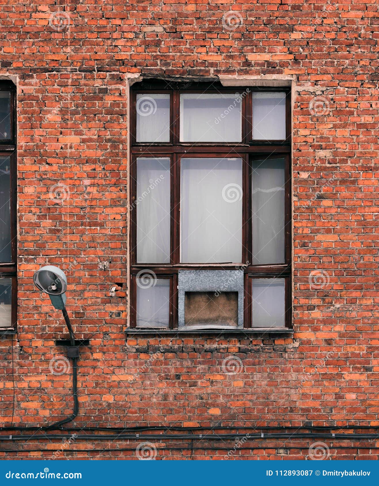 Window on the Facade of an Old Brick Building. Loft-style Architural ...
