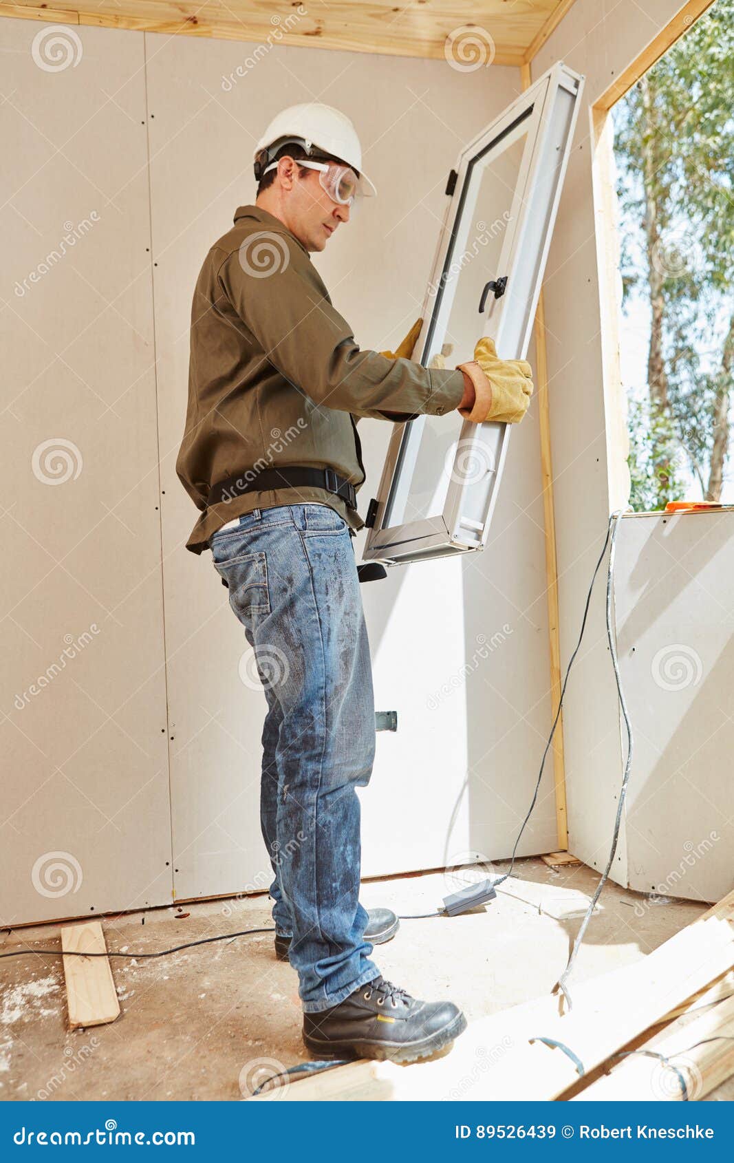 Window fitter at woodhouse stock image. Image of builder - 89526439