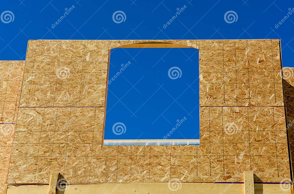 Window Frame of New Low Rise Building on Blue Sky Background. Stock ...