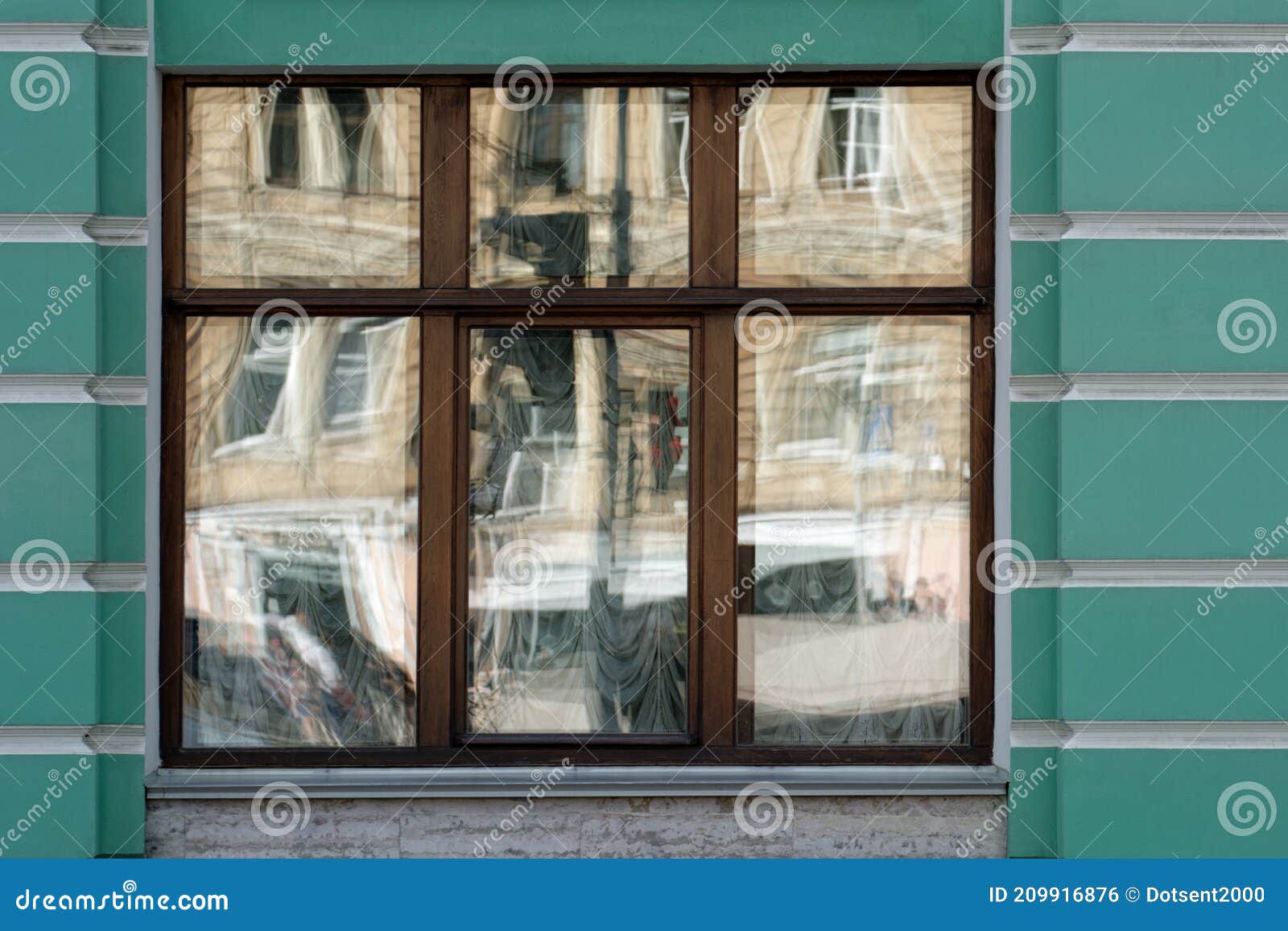 Window on a green wall stock photo. Image of city, cityscape - 209916876