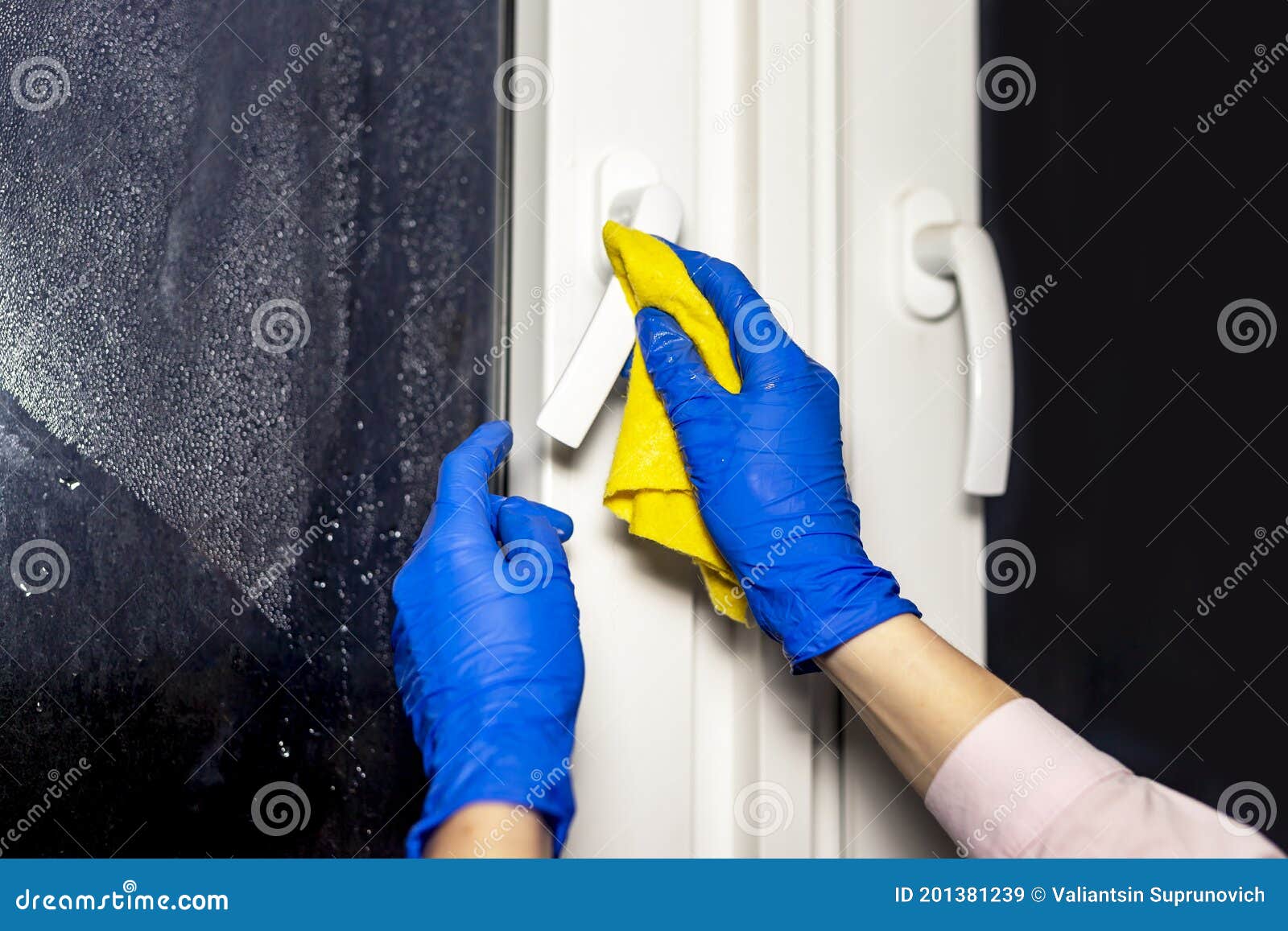 Window Handles Cleaning or Sanitizing with Sanitizer at Night Stock ...