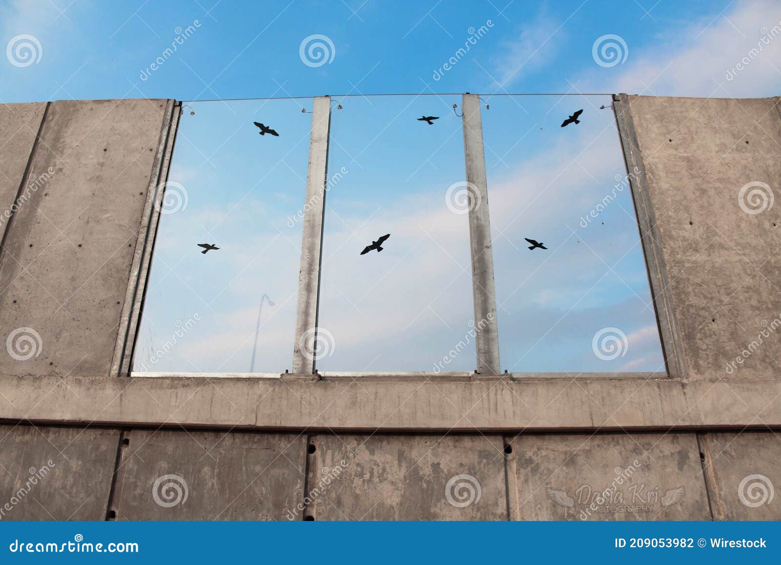 Window in a highway wall stock photo. Image of flying - 209053982