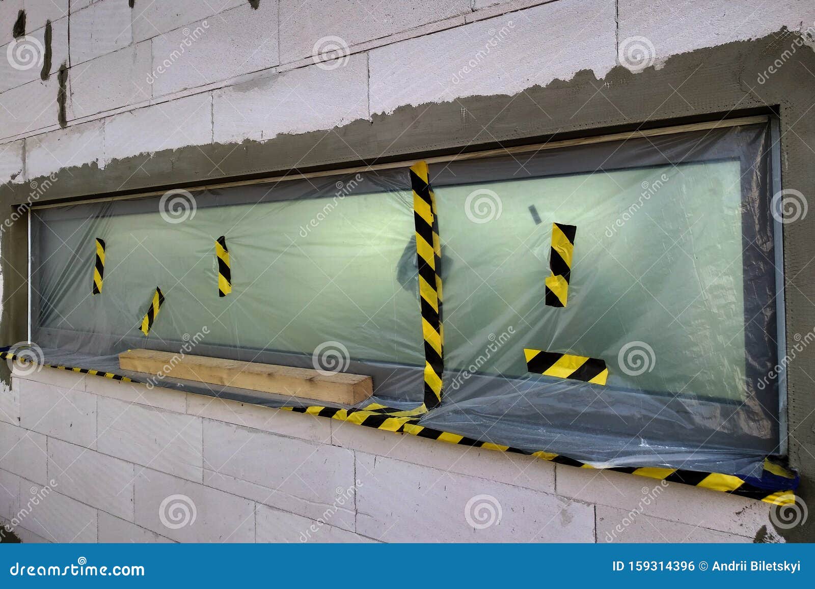 Window of a House Under Construction Covered with Protective Plastic ...