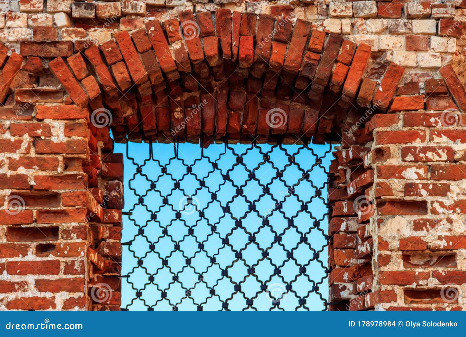Window with Iron Grating in Wall of Ancient Red Brick Building Stock ...