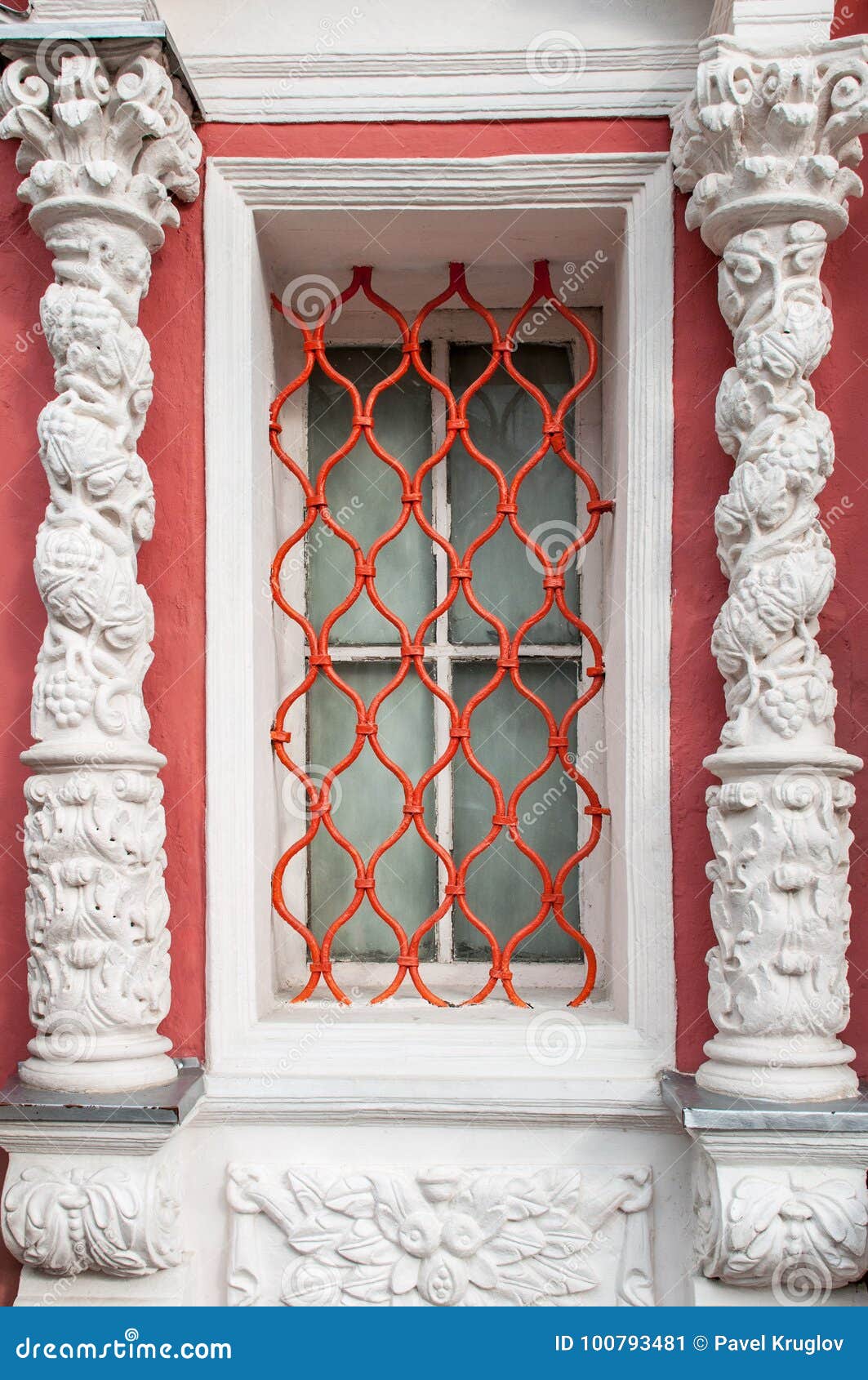 A Window in a Lattice between Two Symmetrical Columns Stock Image ...