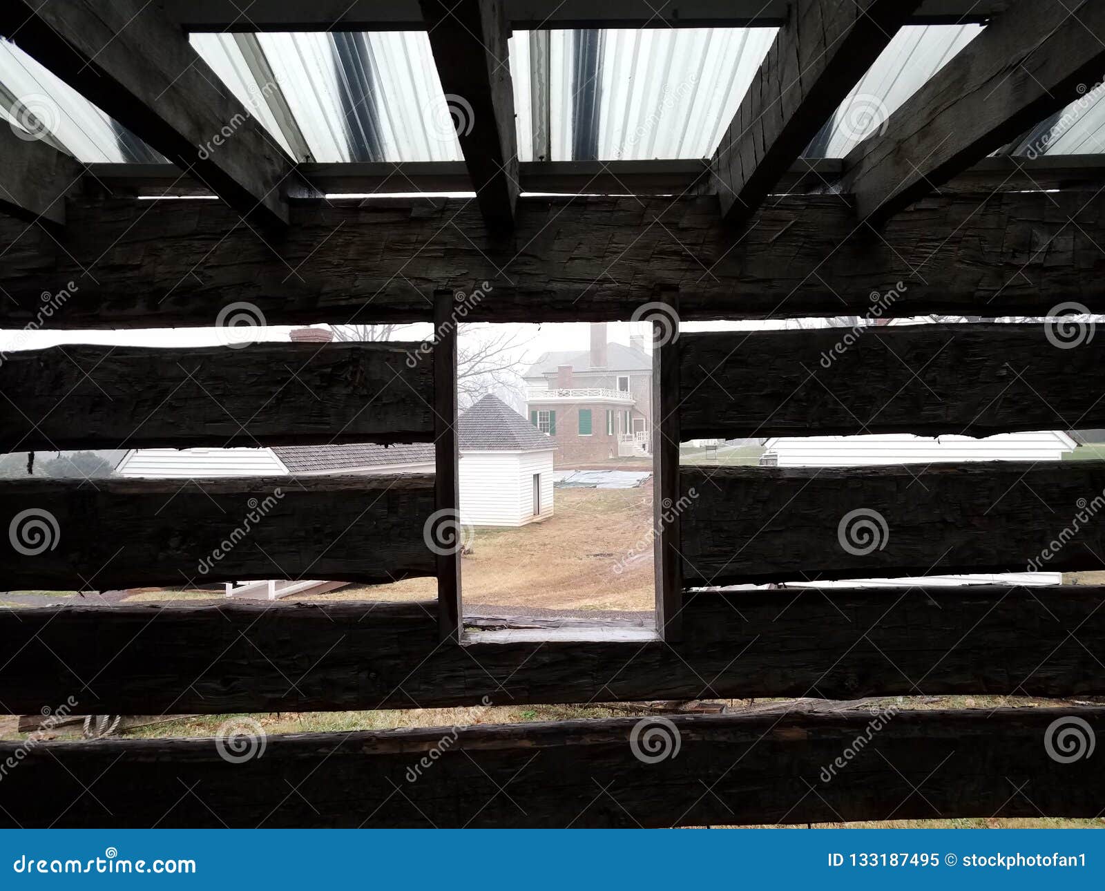 Window in Log Cabin Looking Outside To Buildings Stock Image - Image of ...