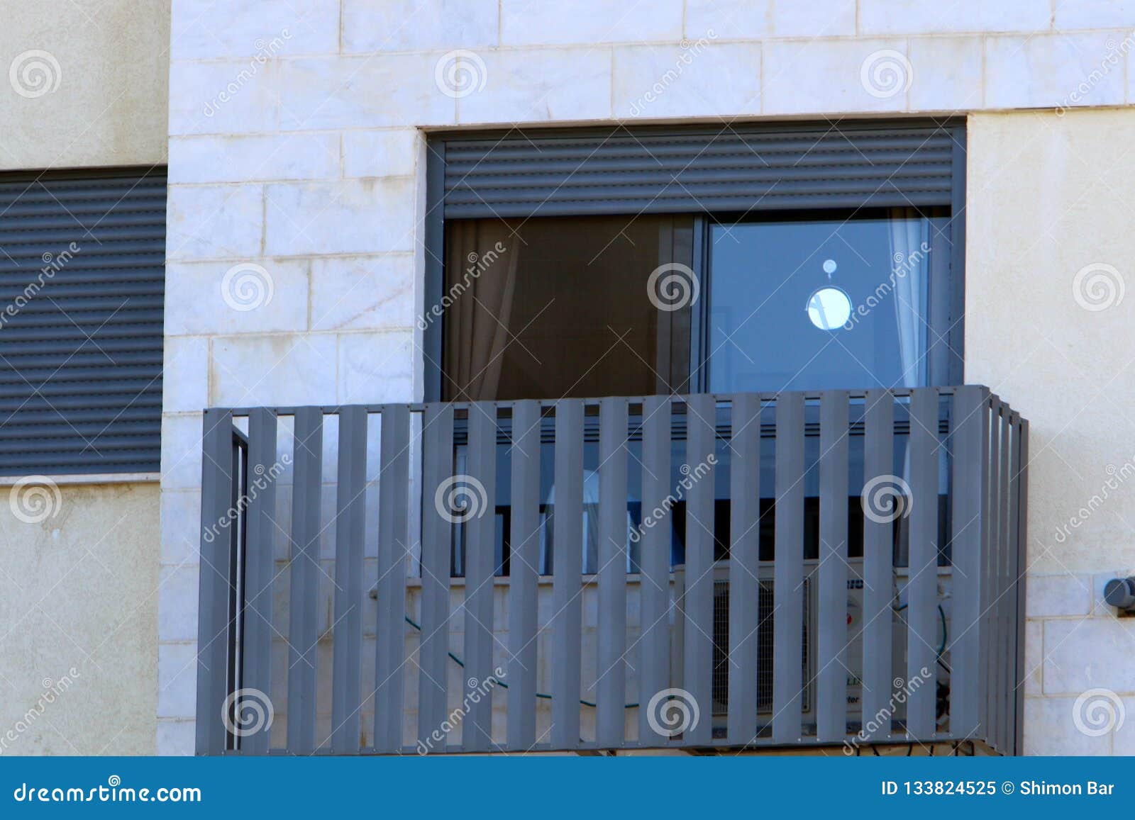 Small window in a big city stock image. Image of door - 133824525