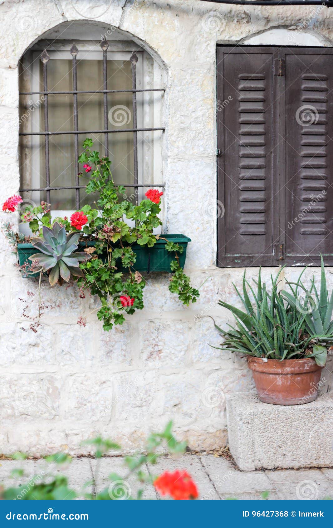 Window with Openwork Wrought Iron Lattice and Iron Shutters Stock Photo ...