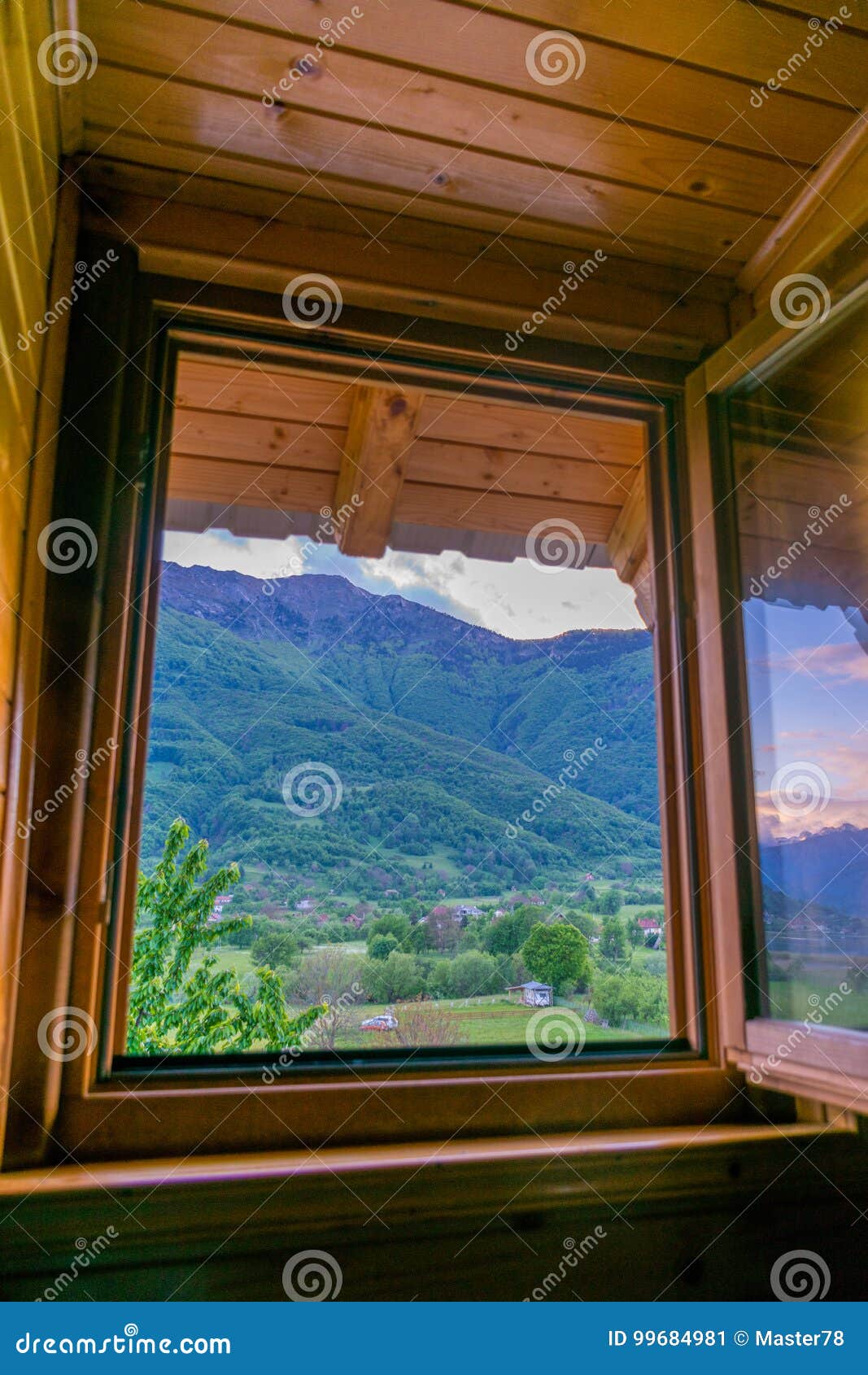 Window Overlooking the Mountains in the Small Town Stock Image - Image ...
