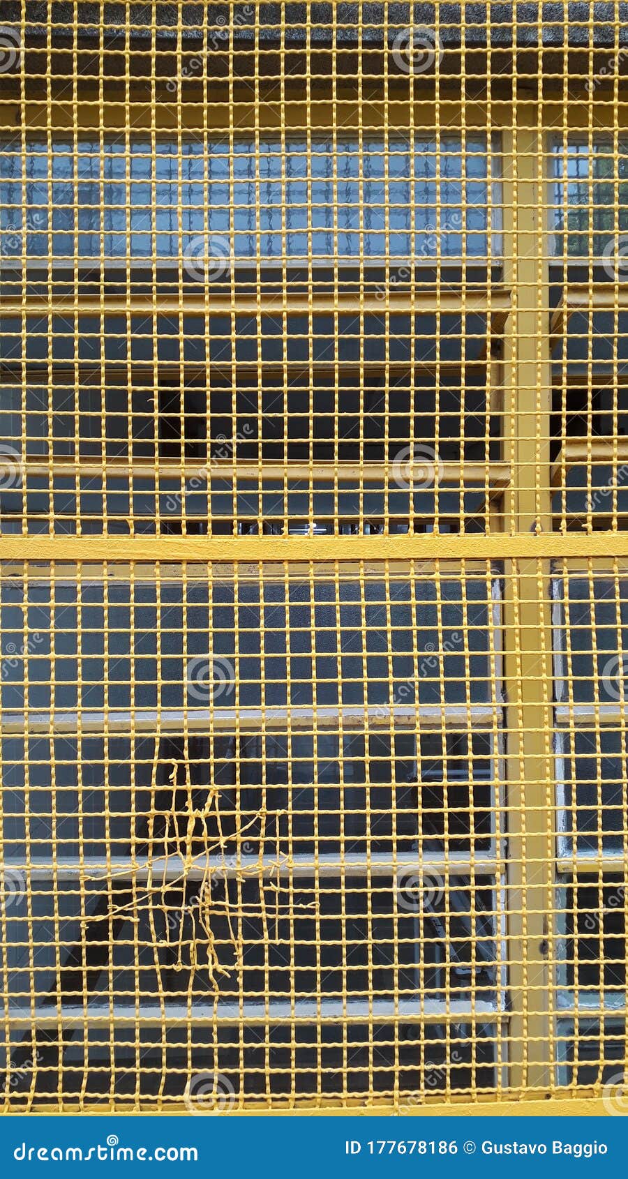 Window with Patched Yellow Grid Stock Photo - Image of building, urban ...