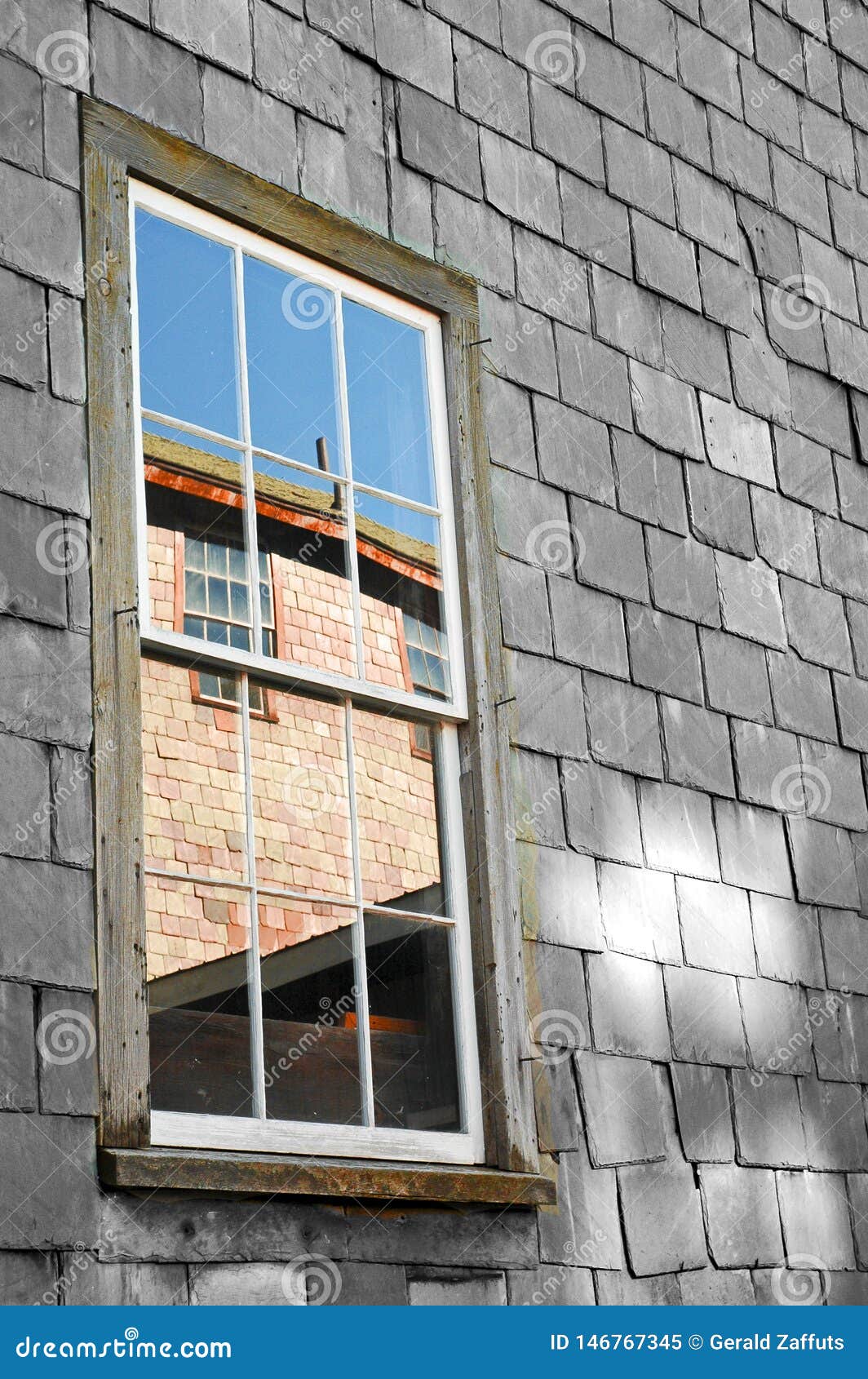 Window with Reflection on Slate Shingled Building Stock Image - Image ...