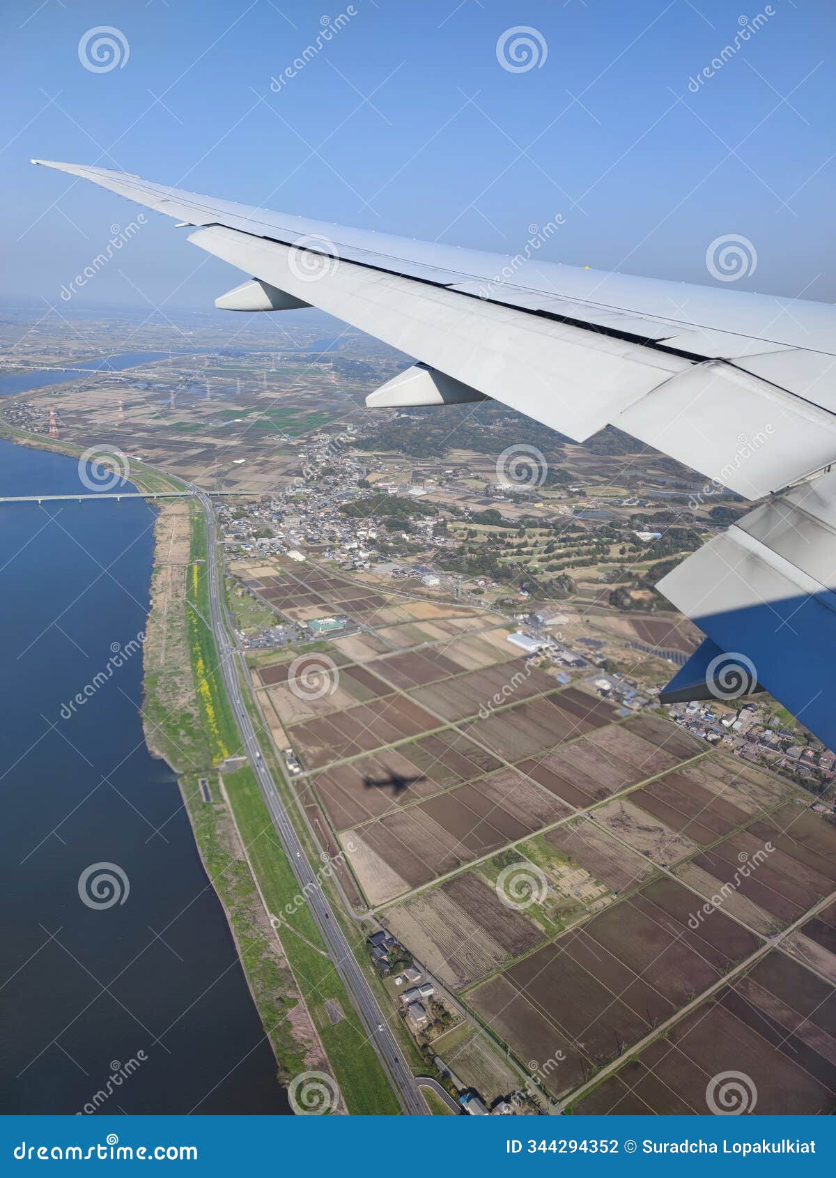 Window Seat View from Airplane Window, Aircraft Shadow, Cross River ...