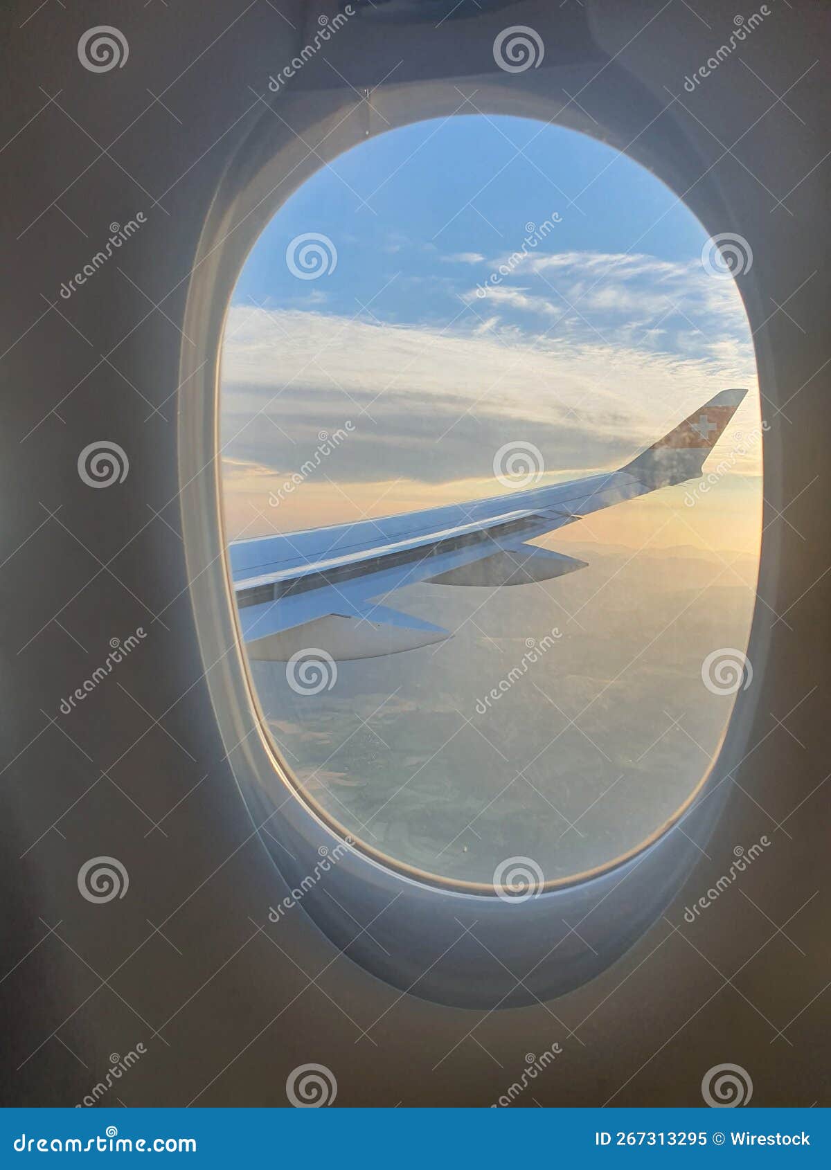 Window Shot from an Airplane Stock Image - Image of light, wing: 267313295