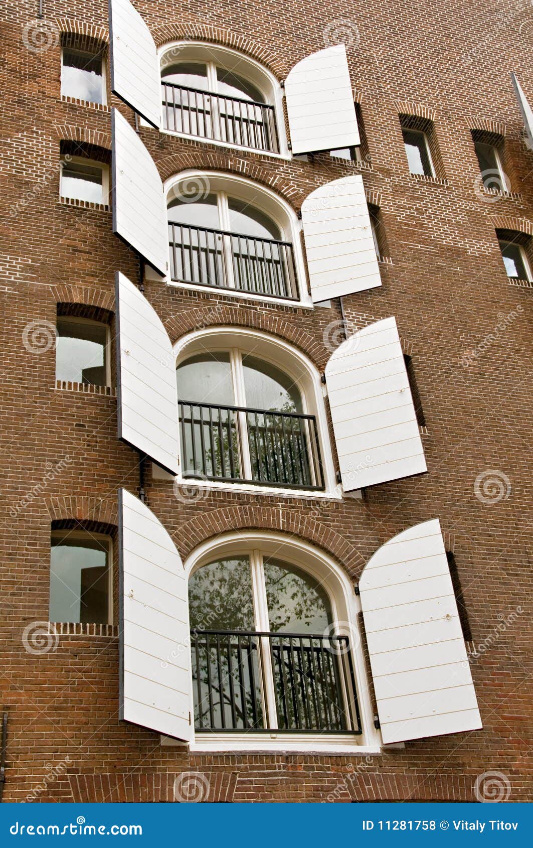 Window Shutters on Brick Building Stock Photo - Image of style, street ...