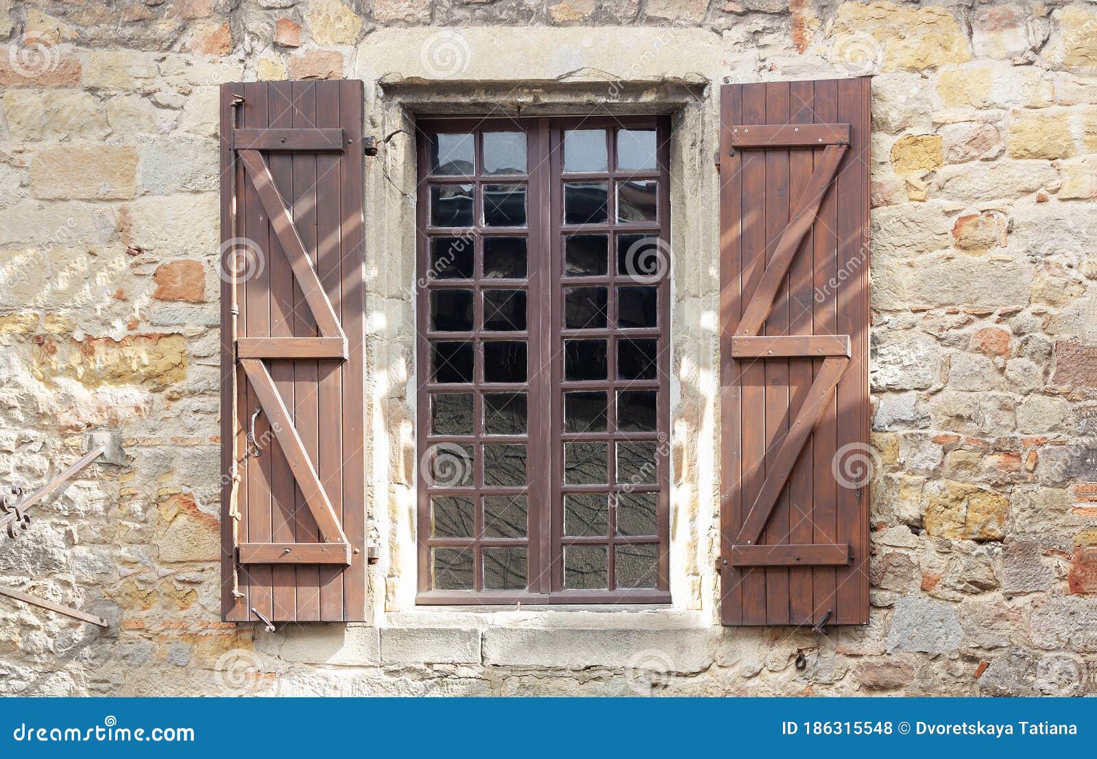 Window with Shutters on the Wall of the Old House Stock Photo - Image ...