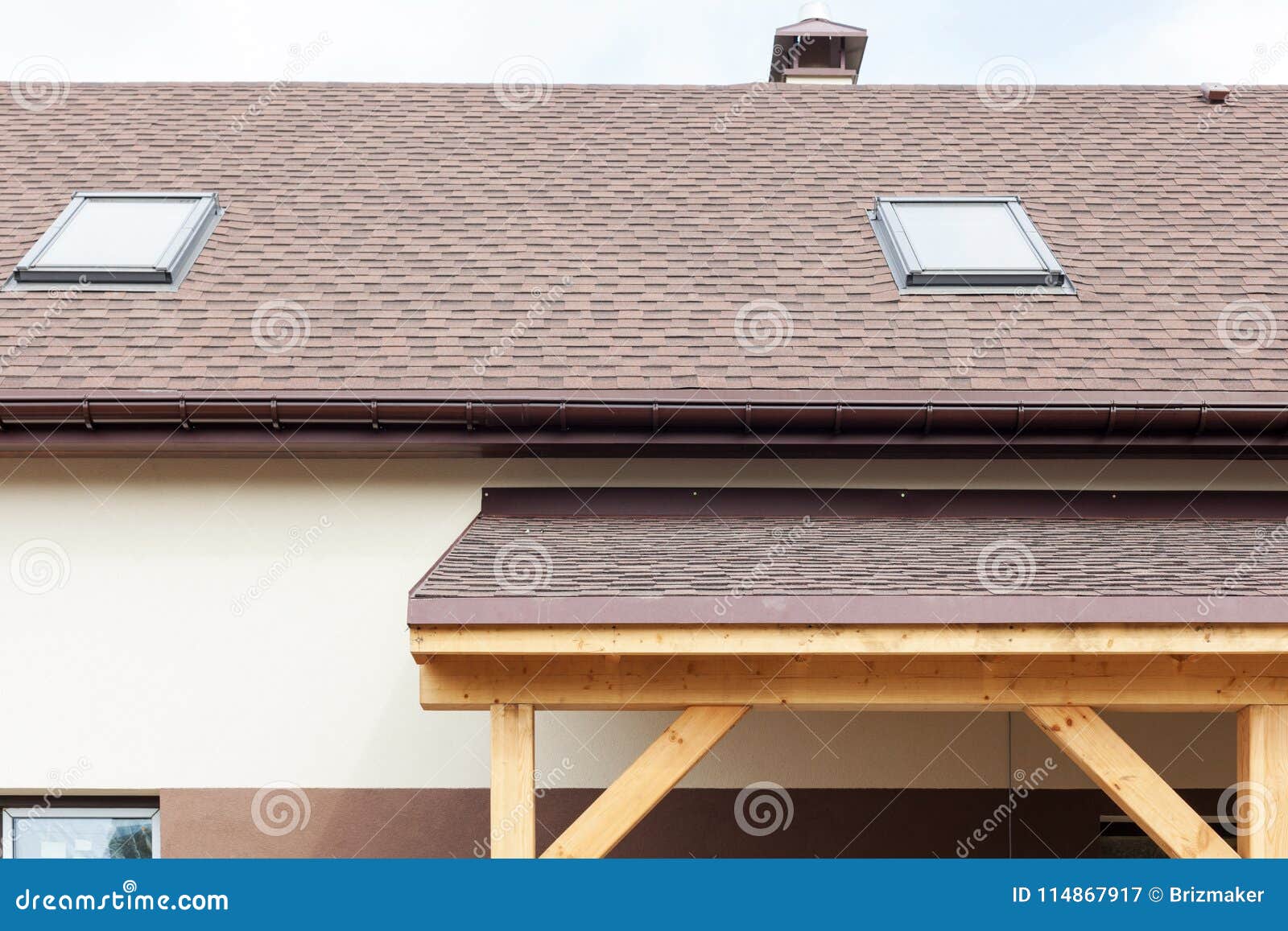 Window Skylight on a Roof with Asphalt Shingles or Bitumen Tiles Under ...