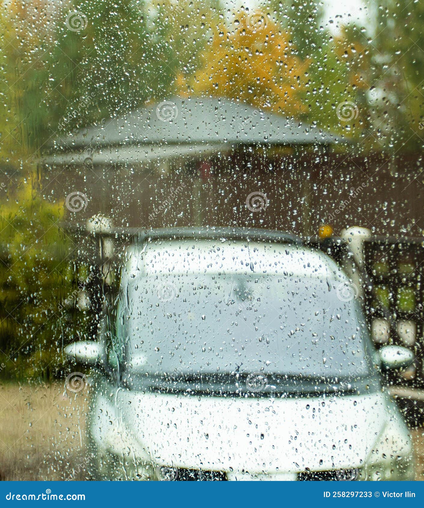 Through the Window Splashed with Autumn Rain One Can See a Car Standing ...