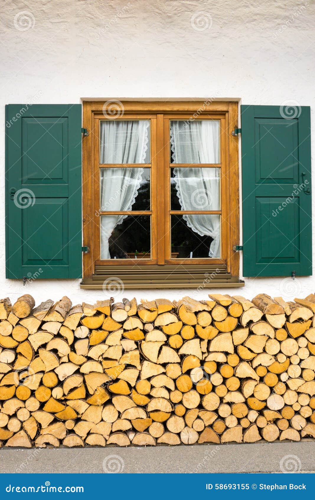 Window and stack of wood stock image. Image of buildings - 58693155