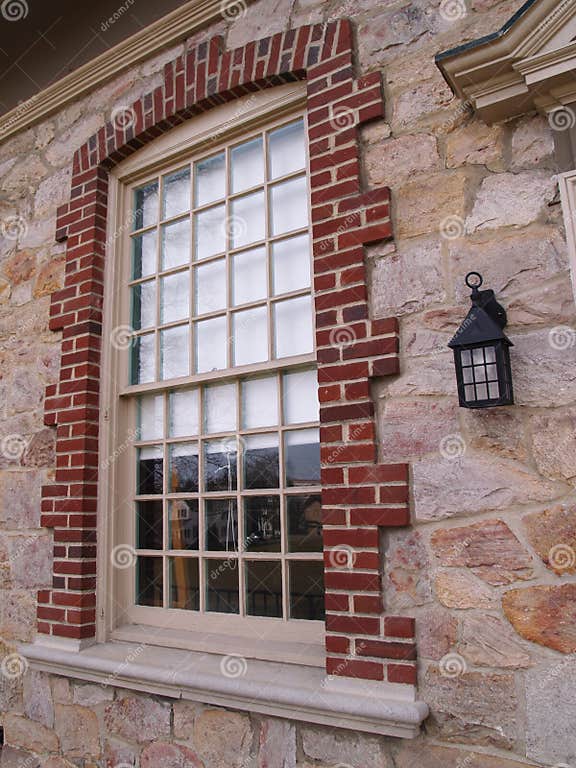 Window on a stone building stock image. Image of style - 4762915