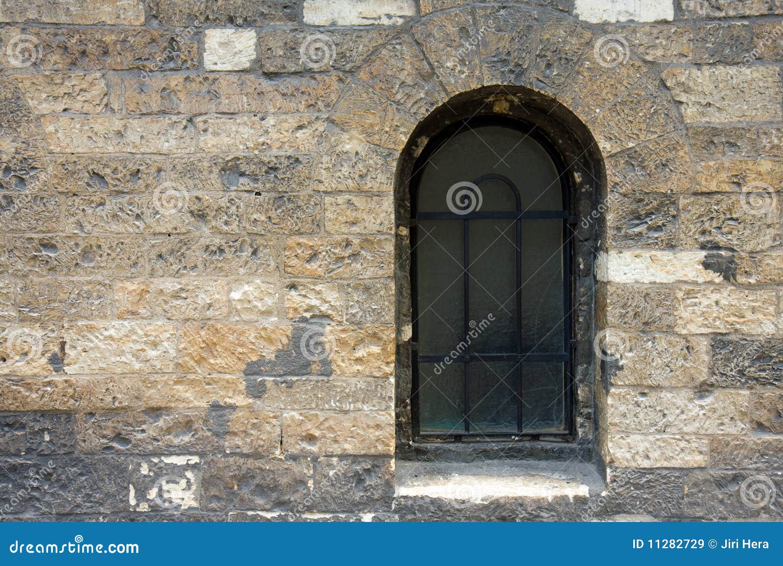 Window in stone wall stock image. Image of construction - 11282729