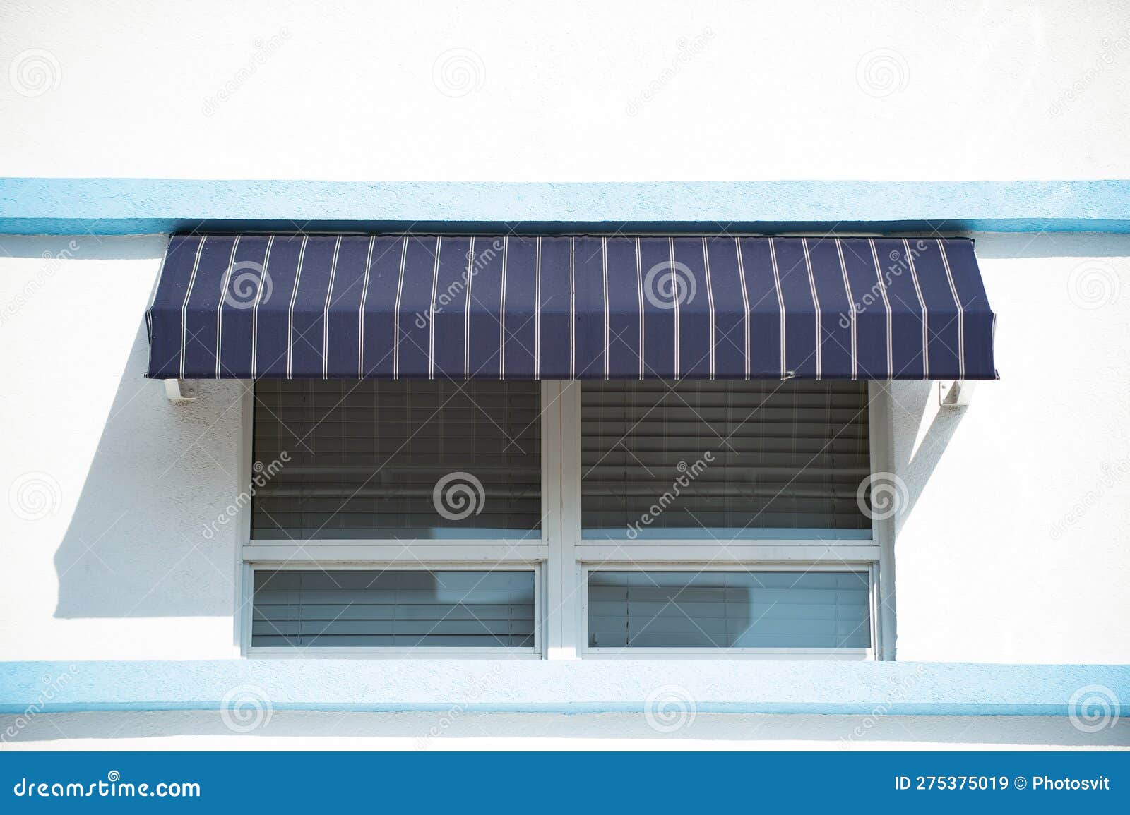 Window Sunblind on the Building. Striped Window Sunblind. Window ...