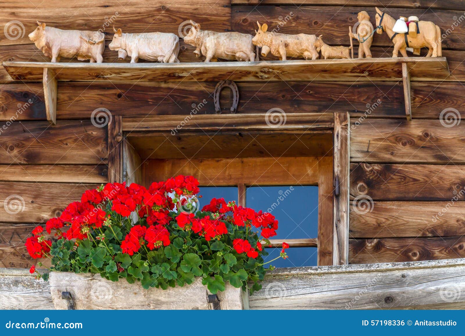 Alpine Farmhouse And Barn On A Hill In Late Afternoon Light Against ...