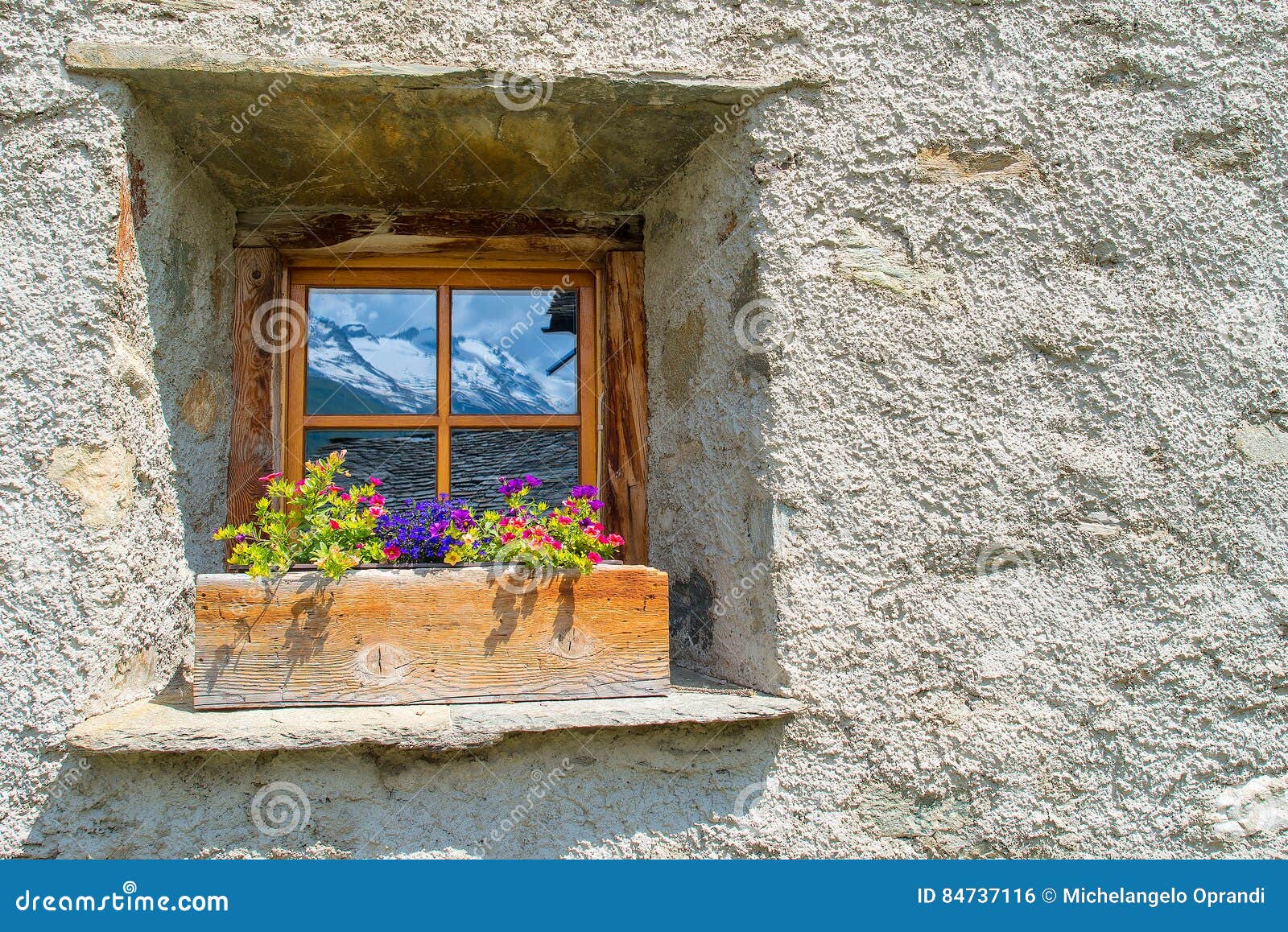 Window Typical of the Swiss Alps, Where the Mountains are Reflected ...