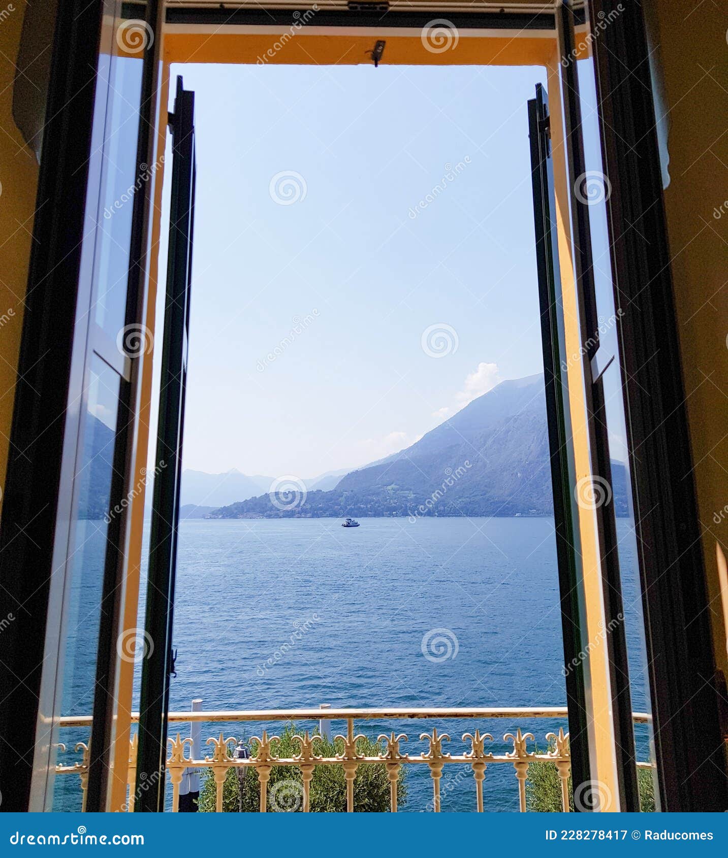 Window view of Lake Como stock image. Image of peace - 228278417