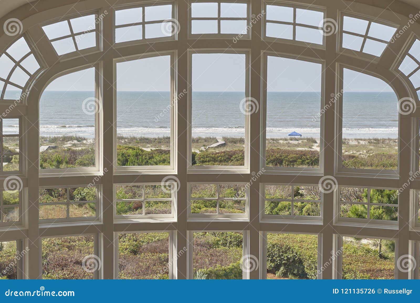 Window view of ocean beach stock photo. Image of windowpane - 121135726