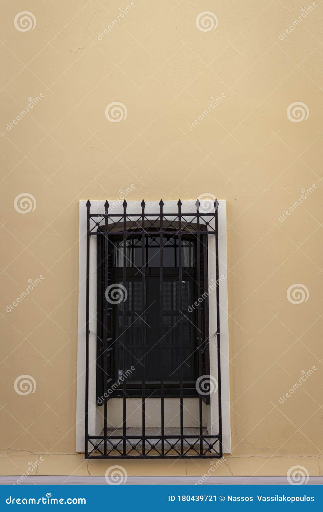 Window with Metal Outer Railing on Smooth Beige Clean Wall Stock Image ...
