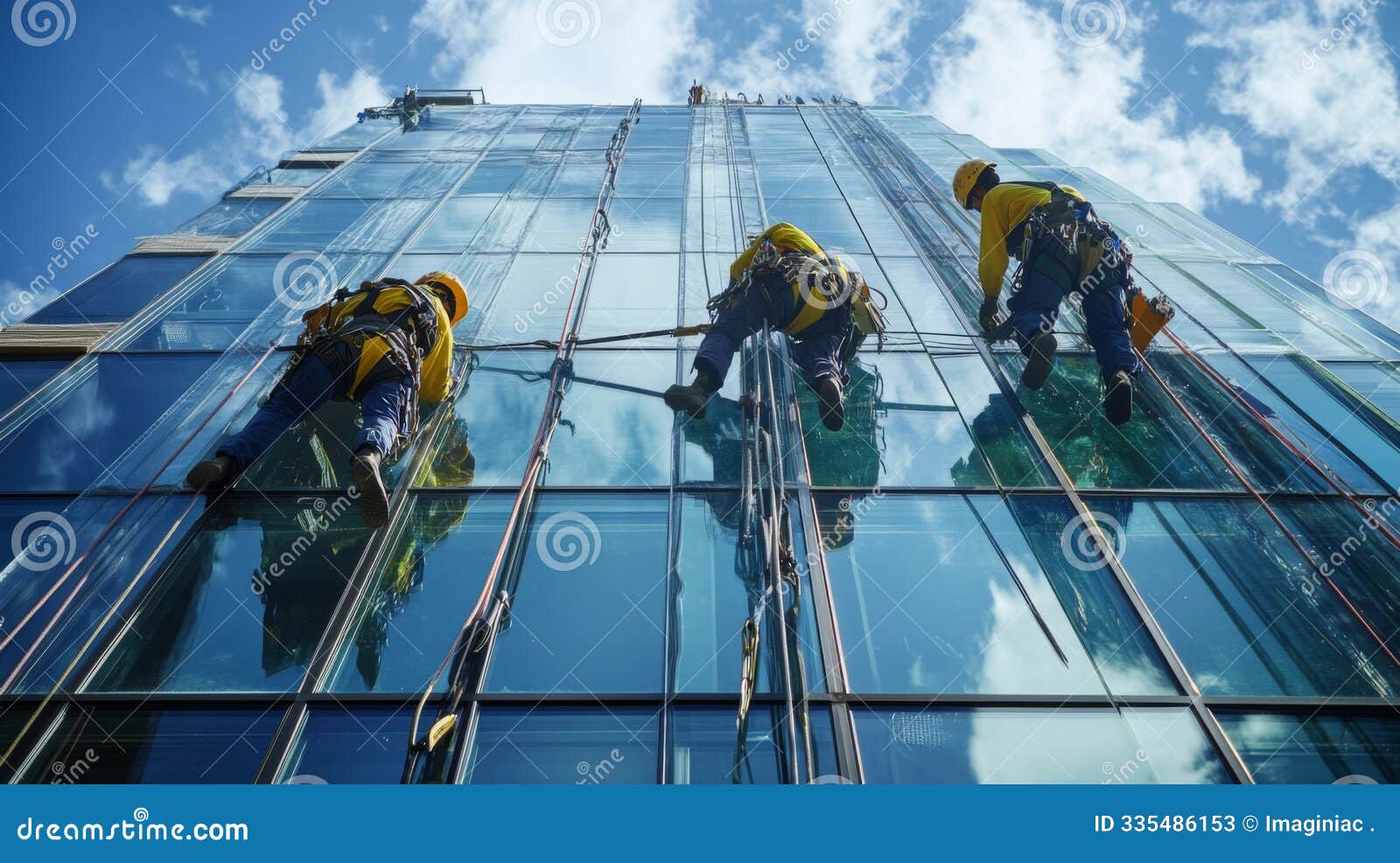 Two Window Washers Cleaning A Modern Building Facade Royalty-Free Stock ...