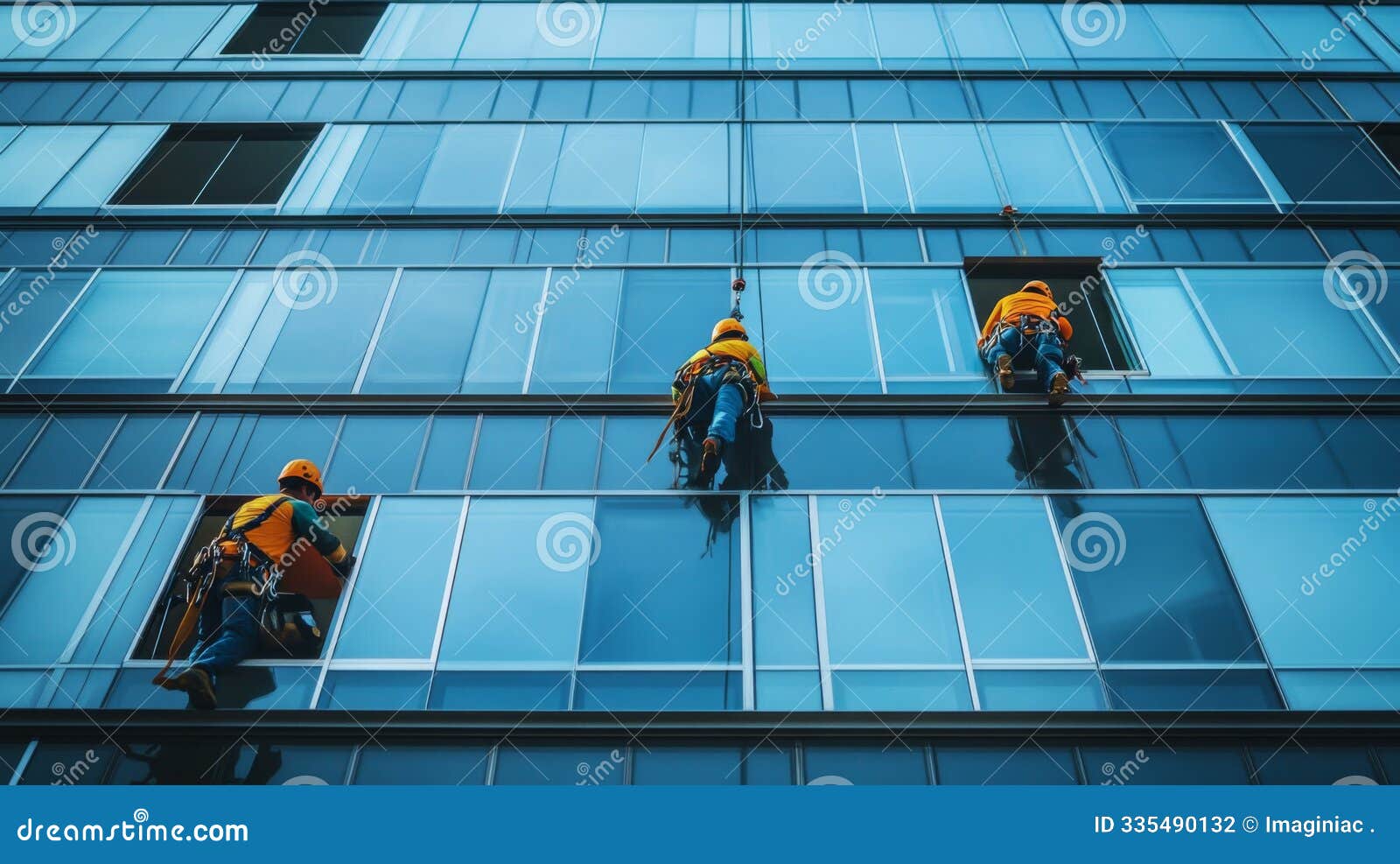 Window Washers Hanging from Ropes on a Modern Building Stock ...