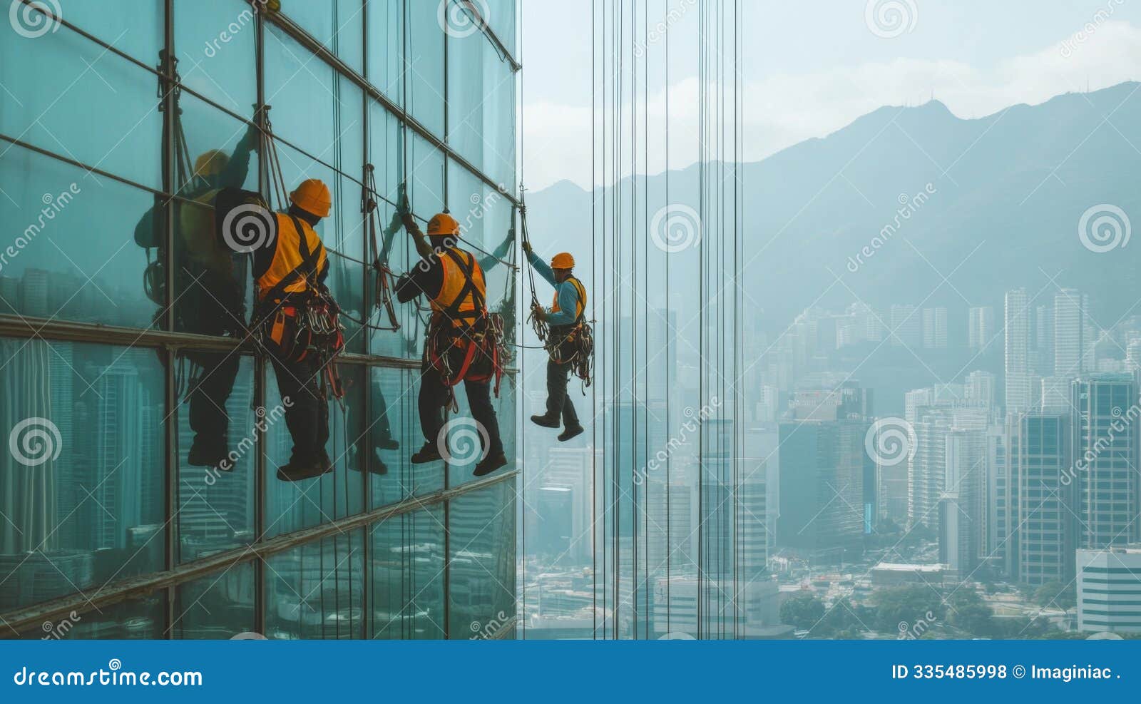 Window Washers on a High-Rise Building with City Skyline View Stock ...