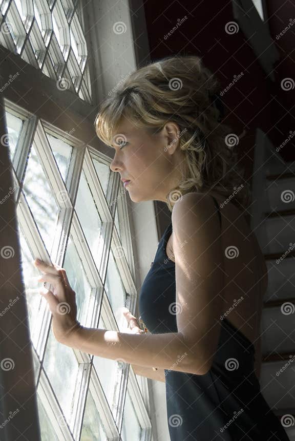 Window watcher stock photo. Image of blond, young, beautiful - 687758