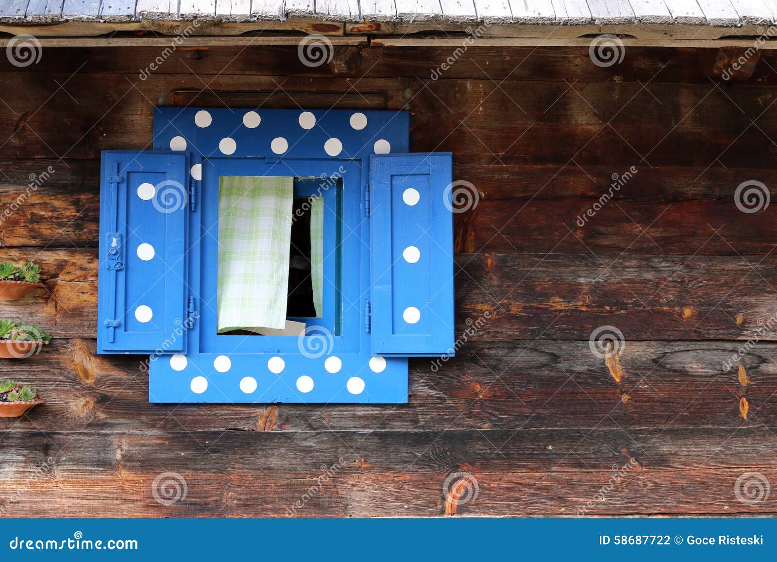 Window on wooden hut wall stock photo. Image of texture - 58687722
