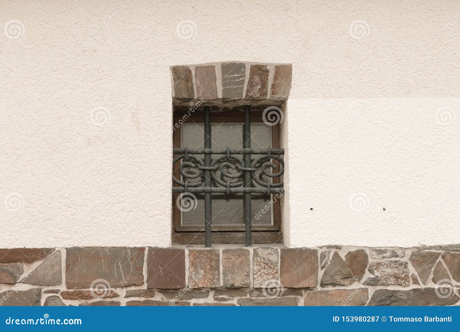 Window with a Wrought Iron Grate and Bricks Germany Stock Image - Image ...
