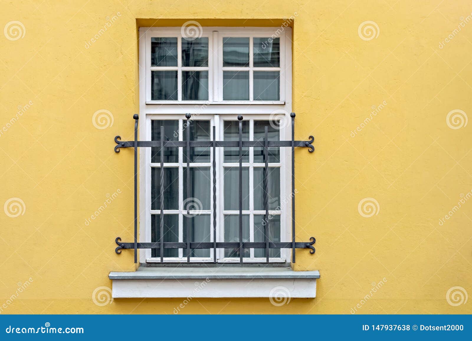 Window on yellow wall stock photo. Image of grate, geometry - 147937638