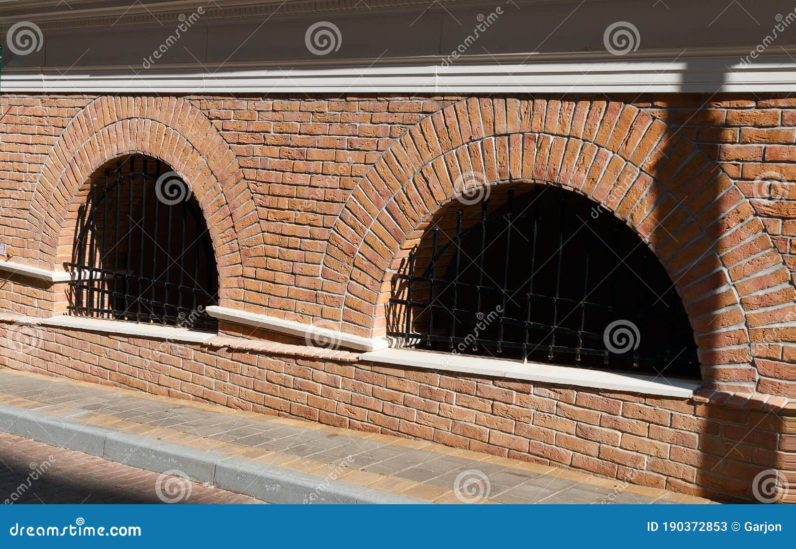 Windows with Bars in the Brick Wall, Arch of Ancient Construction Stock ...