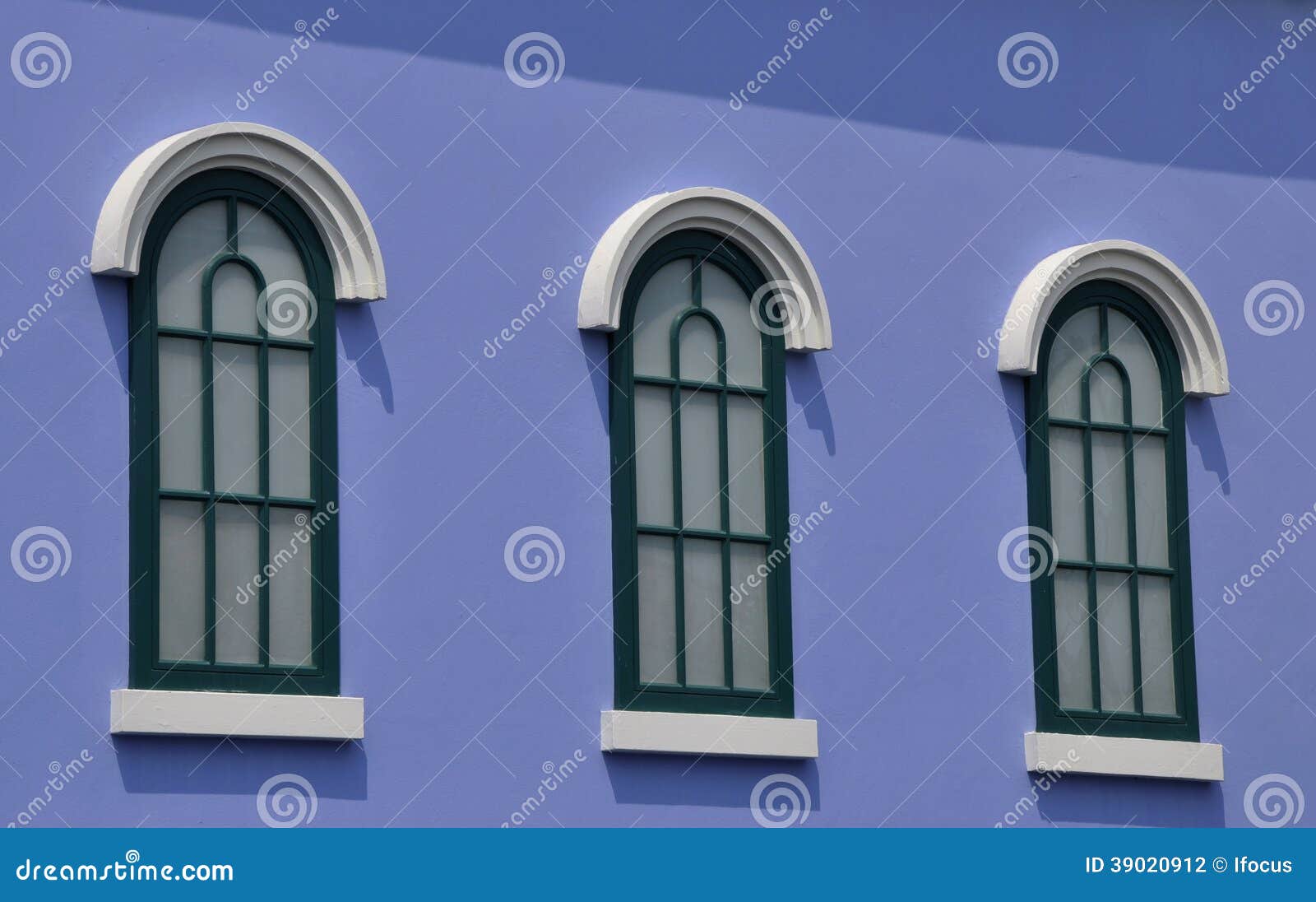 Windows on blue wall stock photo. Image of colors, panel - 39020912