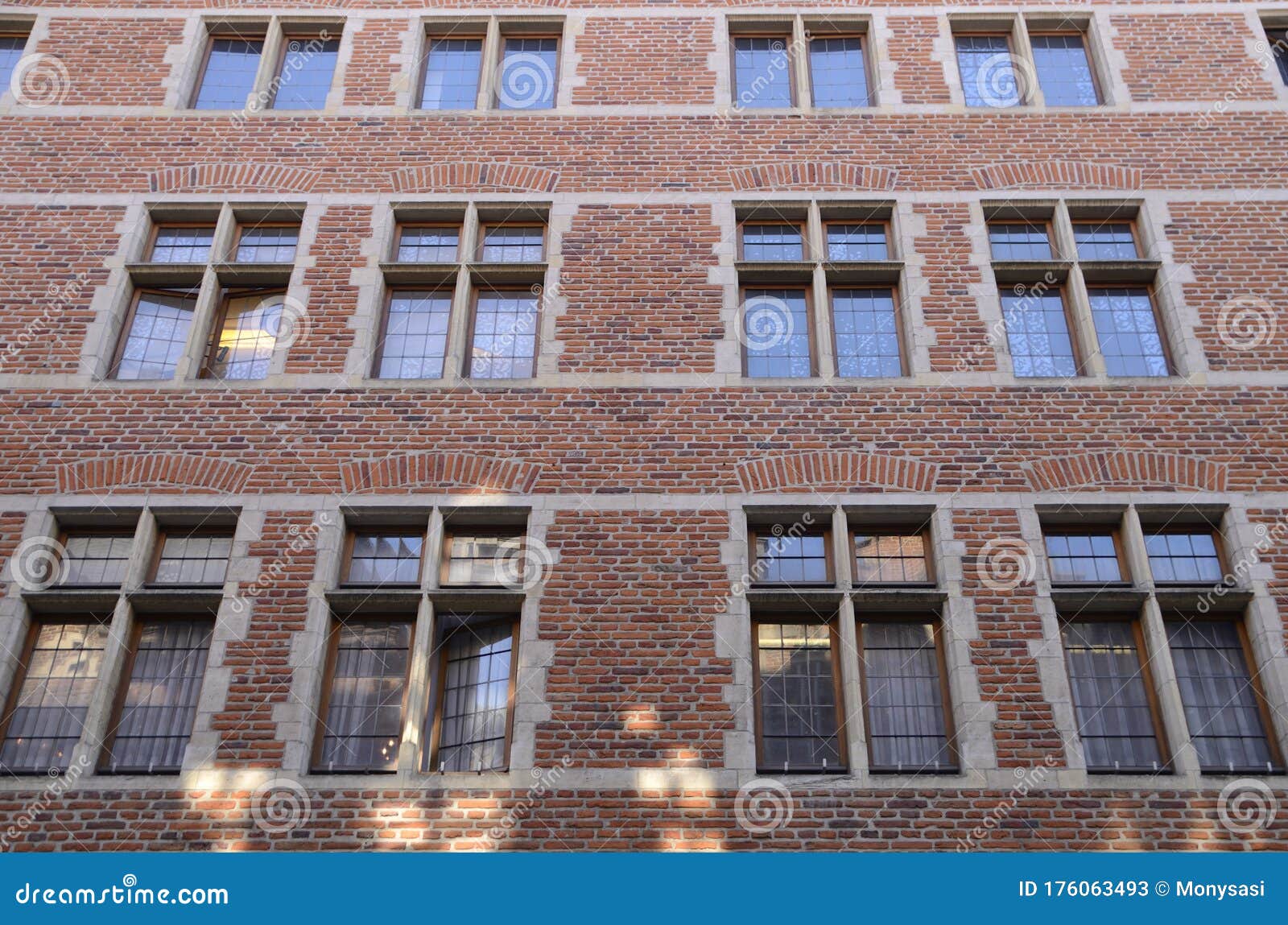 Windows on brick building stock image. Image of outside - 176063493
