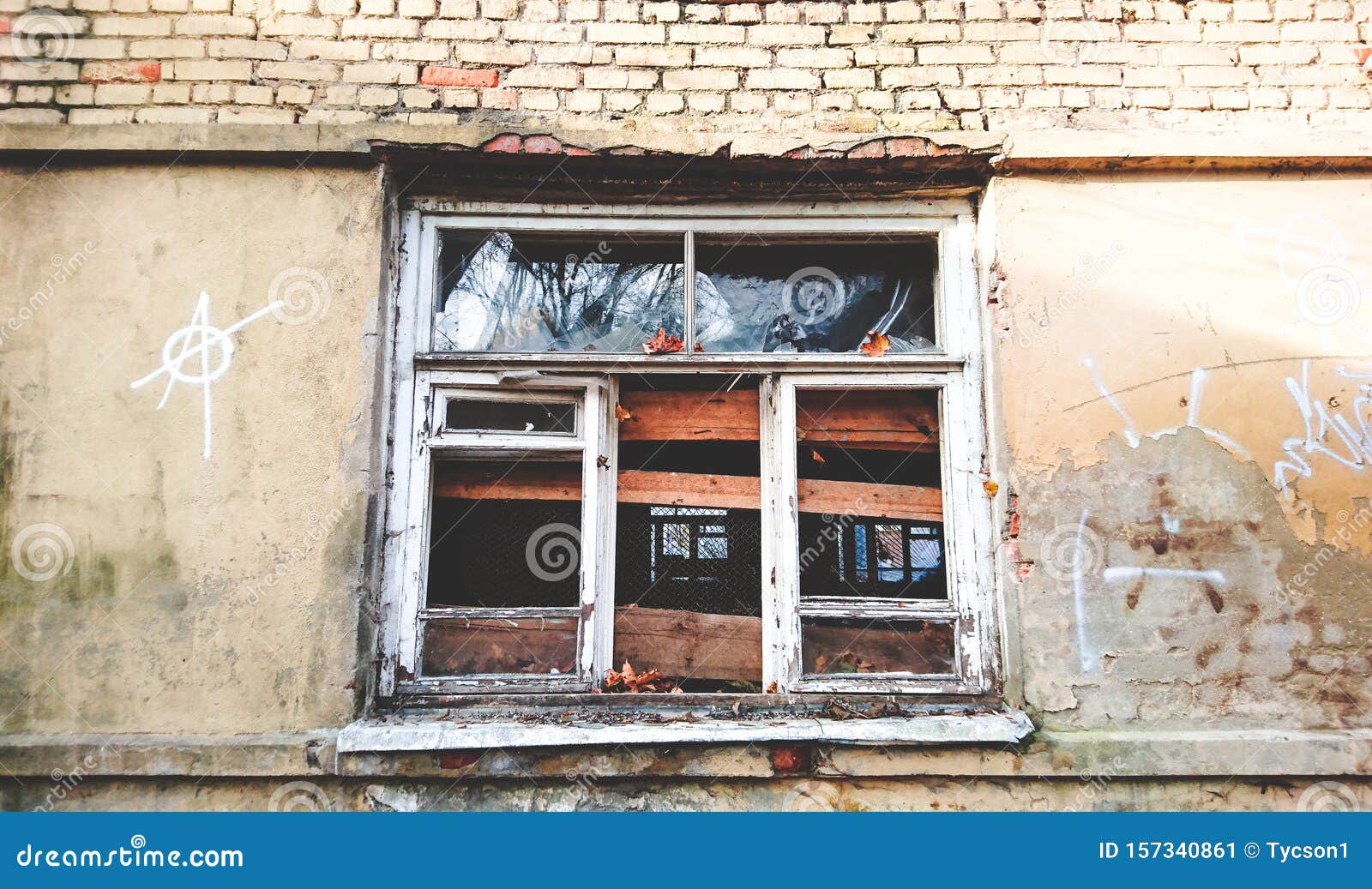 Windows with broken glass stock image. Image of brick - 157340861