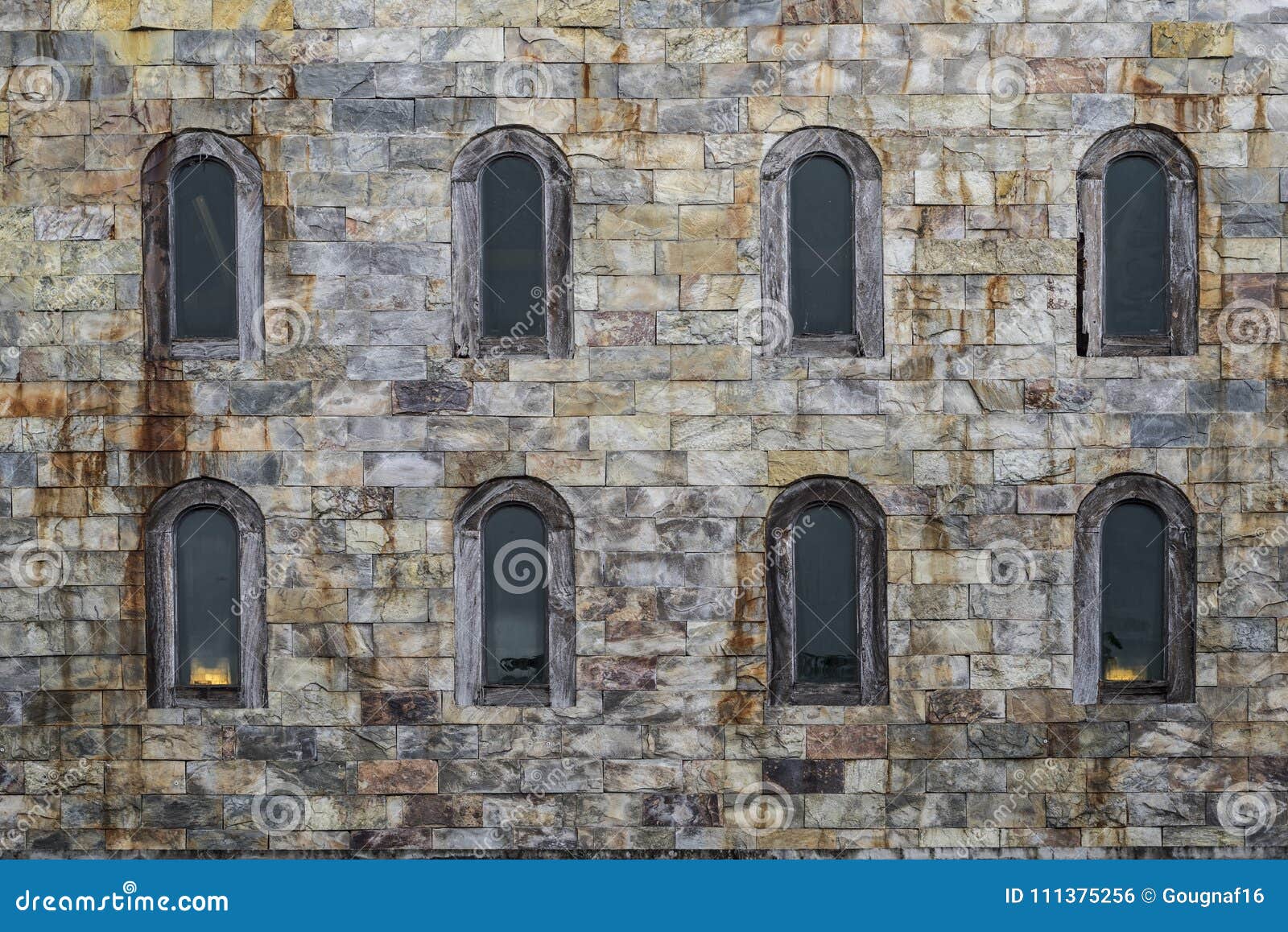 Windows on a castle`s wall stock photo. Image of exterior - 111375256