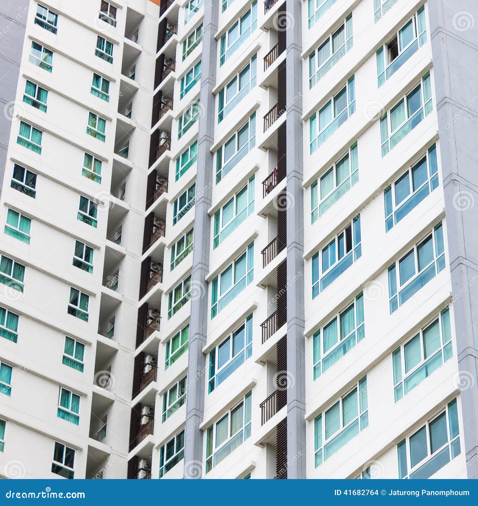 Windows of condominium stock photo. Image of building - 41682764