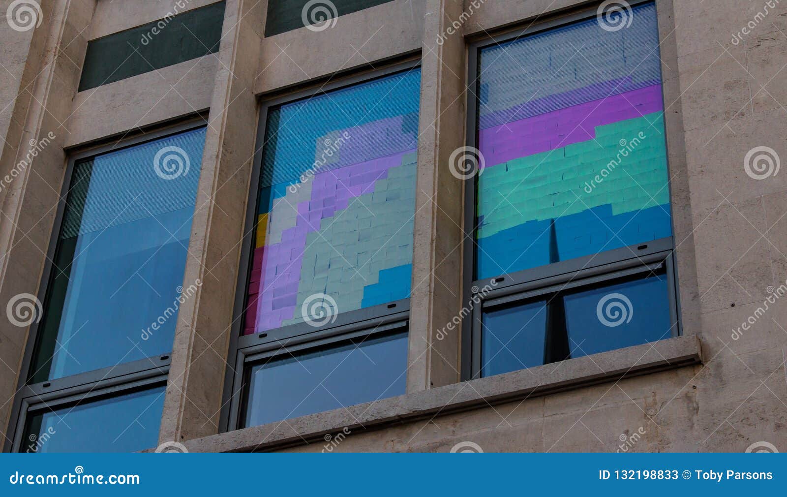 Windows Covered in Sticky Coloured Paper Stock Image - Image of people ...