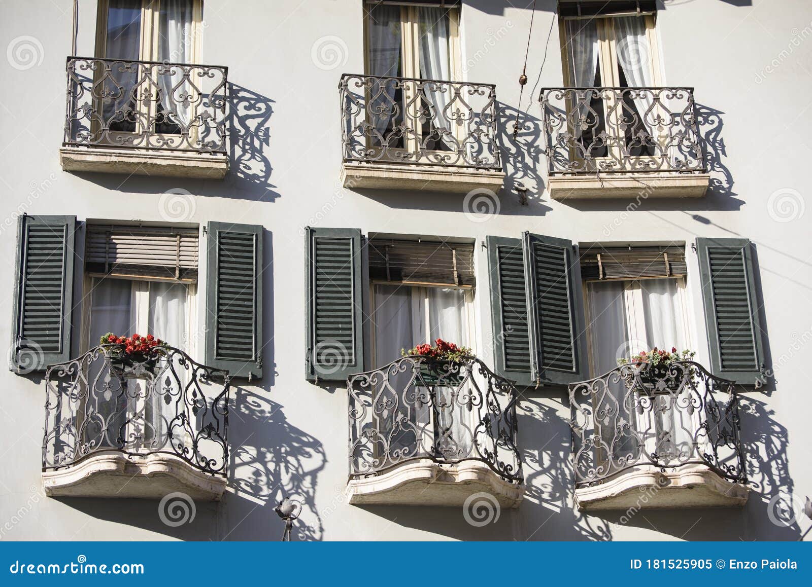 Windows and Doors with Small Triangular Shaped Balcony Stock Image ...